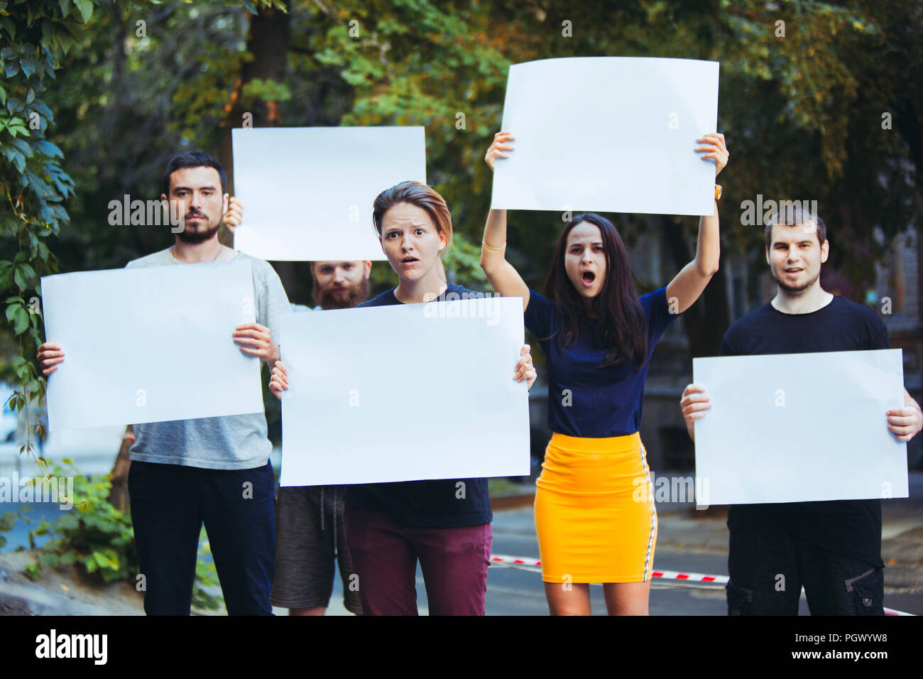 Group of protesting young people outdoors. The protest, people ...