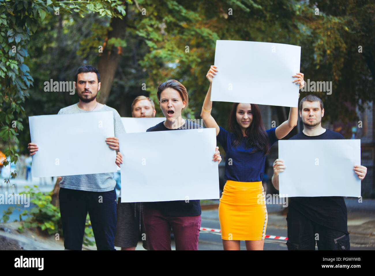 Group of protesting young people outdoors. The protest, people ...