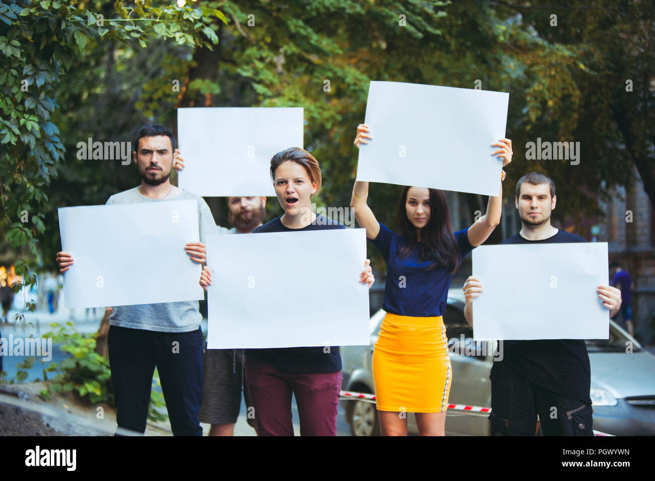 Group of protesting young people outdoors. The protest, people ...