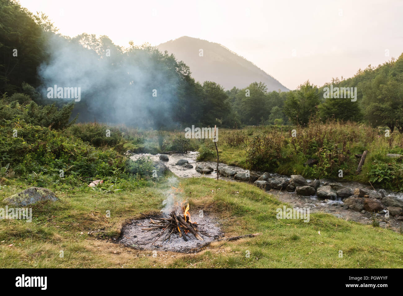 Campfire sunset next water hi-res stock photography and images - Alamy