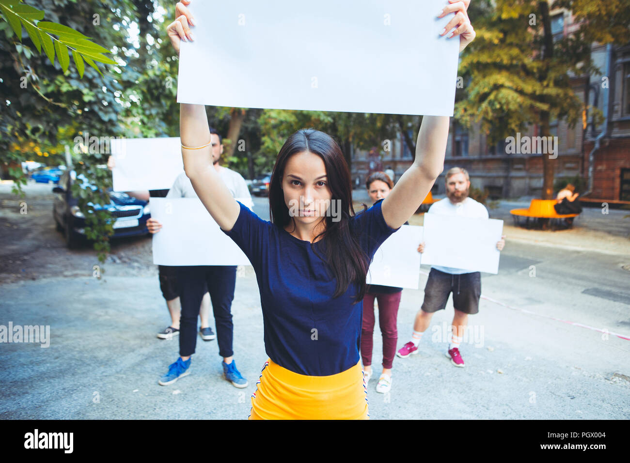 Group of protesting young people outdoors. The protest, people ...
