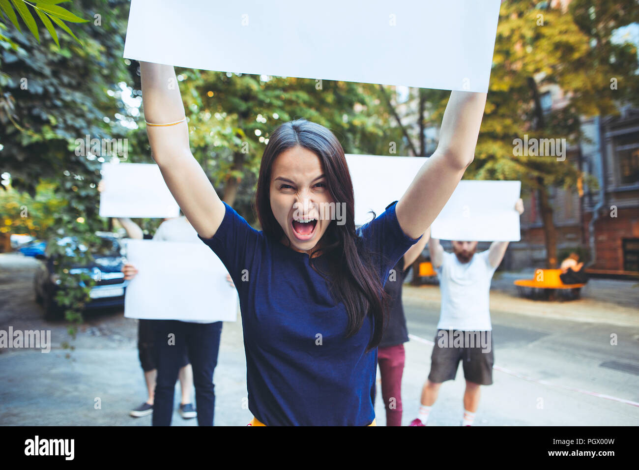 Angry man holding empty protest hi-res stock photography and images - Alamy