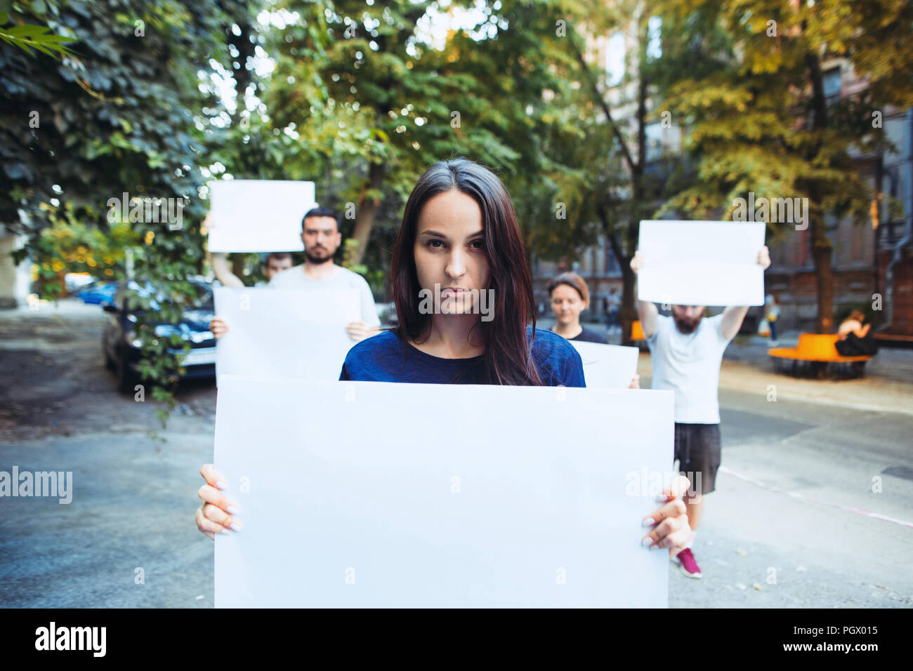 Group of protesting young people outdoors. The protest, people ...