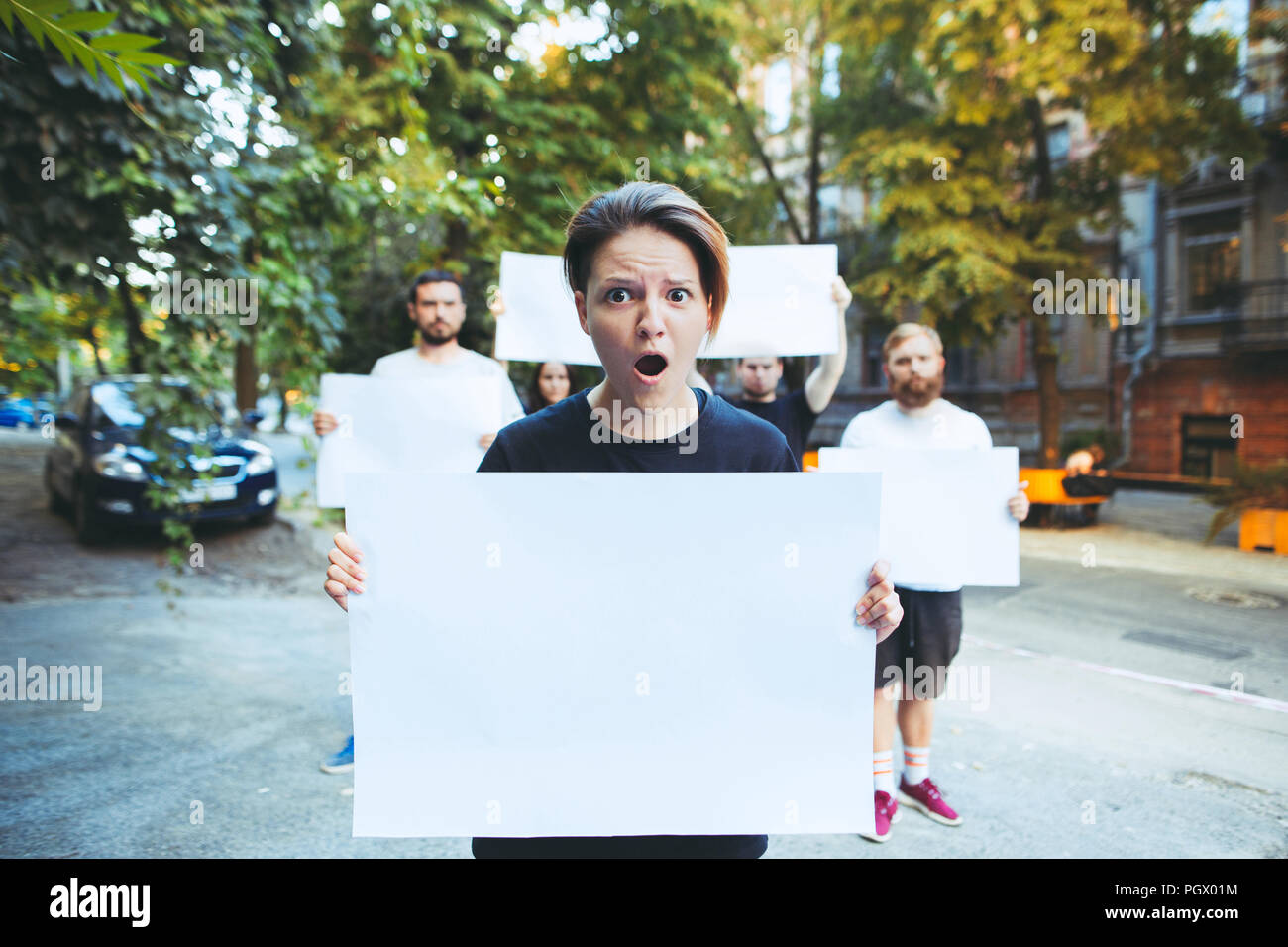 Angry man holding empty protest hi-res stock photography and images - Alamy