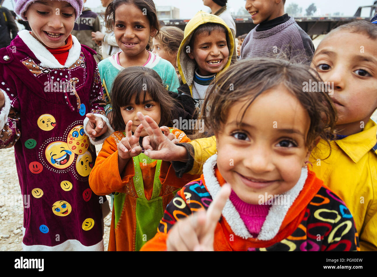 Children playing and call the photo reporters where researchers found ...