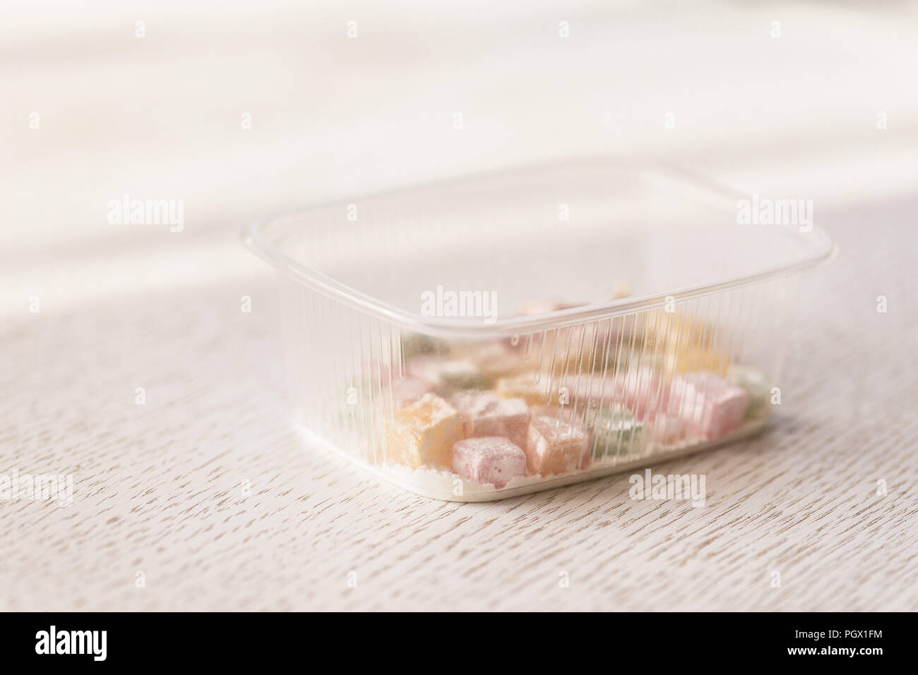 Rahat lukum in the Bank stands on a white table. the view from the top ...