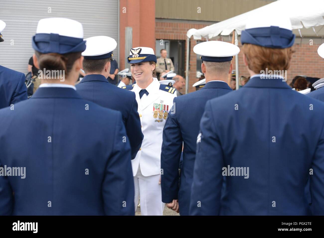 Lt. Jessica Shafer greets members of her future unit during a change of ...