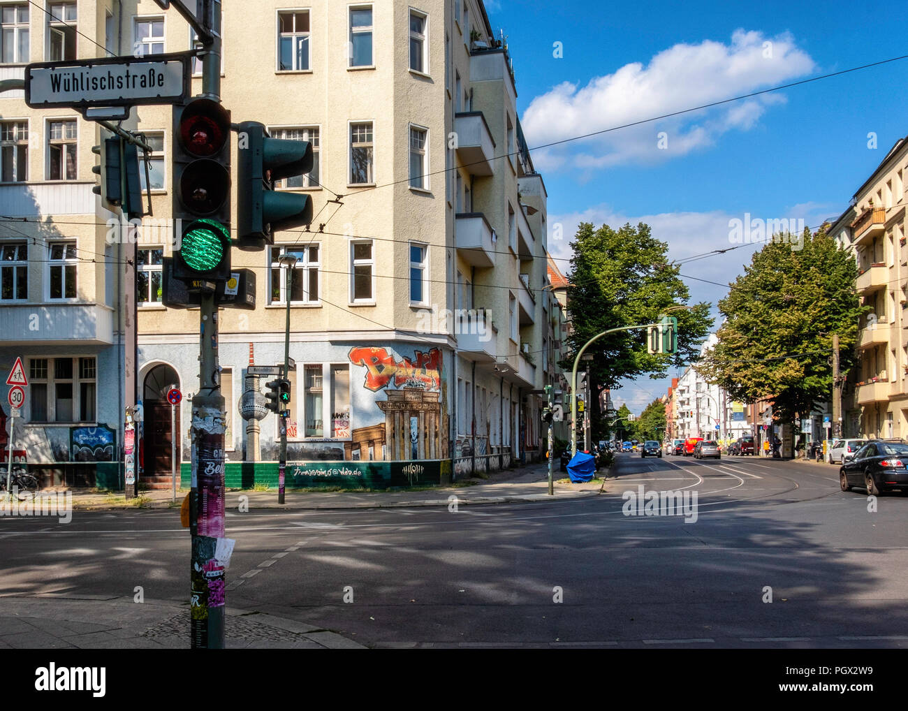 Berlin, Friedrichshain street view with apartment buildings, Tram lines ...