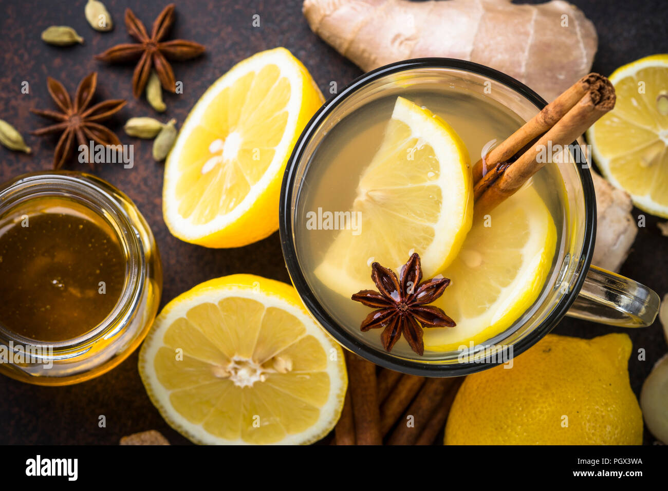 Autumn hot tea with ginger, lemon, honey and spices Stock Photo - Alamy