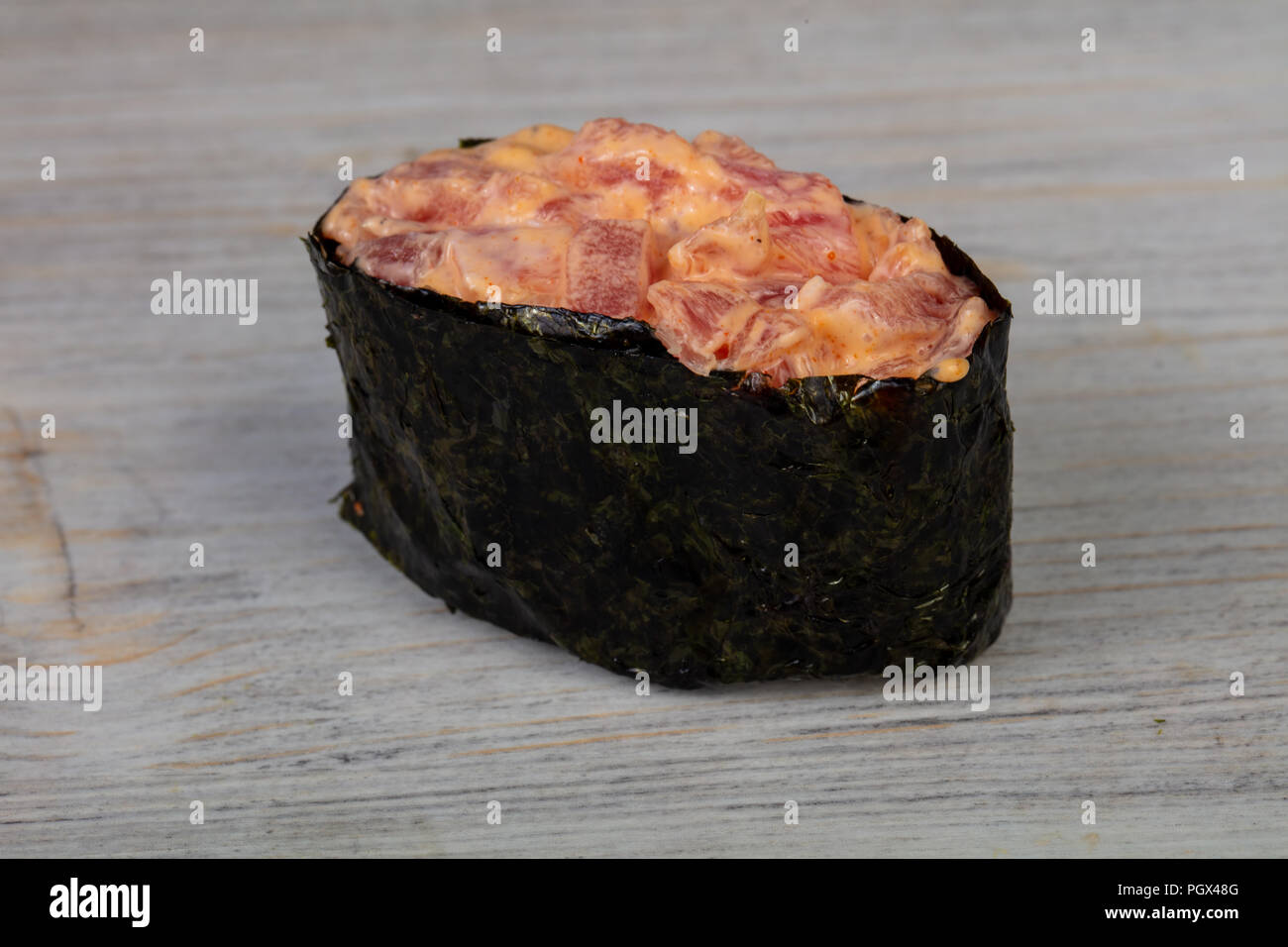 Japanese traditional Spicy gunkan sushi Stock Photo - Alamy