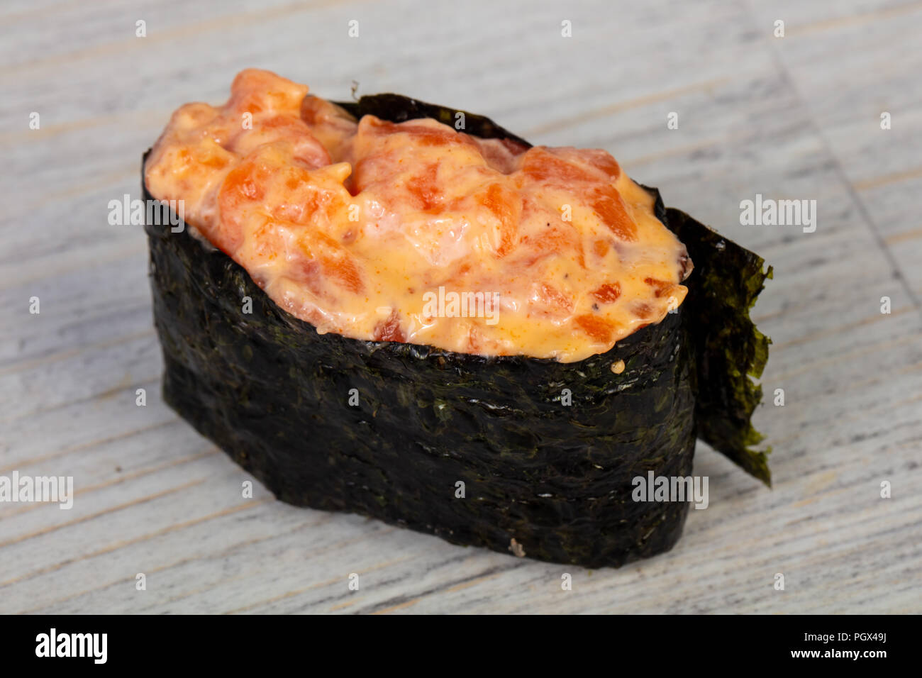 Japanese traditional Spicy gunkan sushi Stock Photo - Alamy