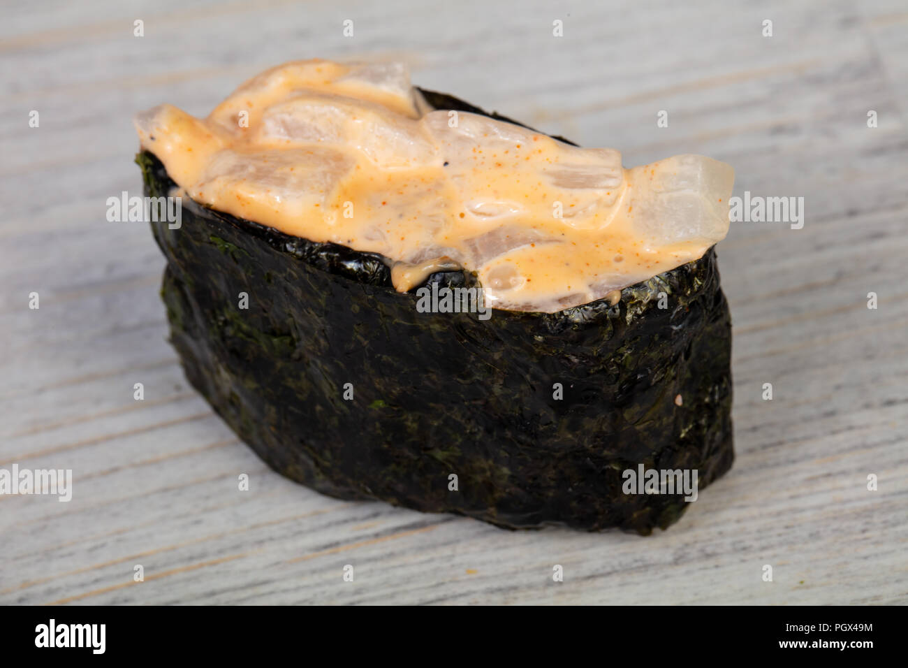 Japanese traditional Spicy gunkan sushi Stock Photo - Alamy
