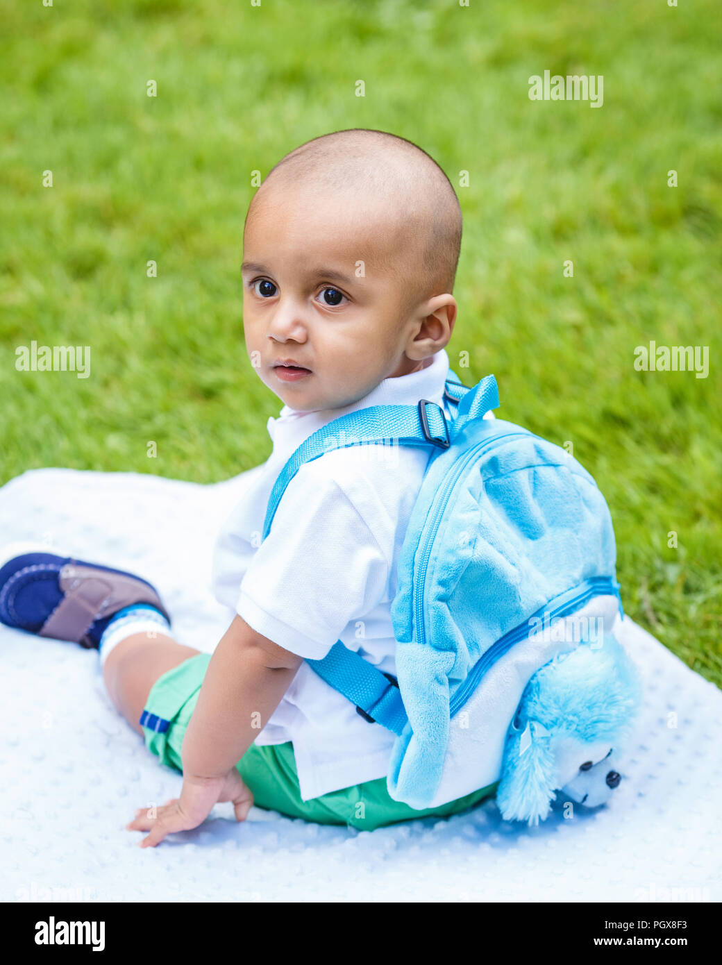 Portrait of cute adorable little indian mixed race infant boy in white ...