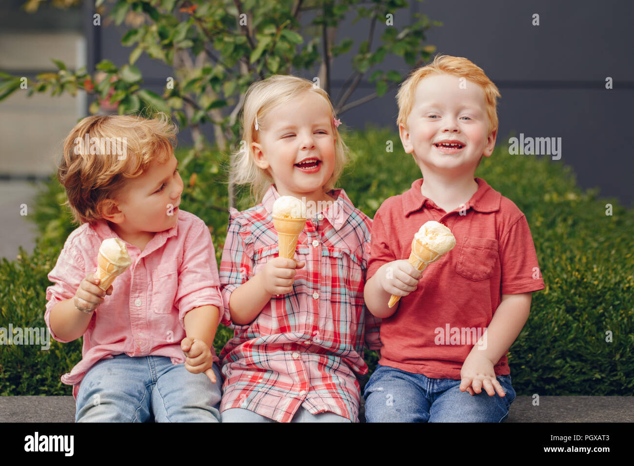 Kids Sharing Ice Cream
