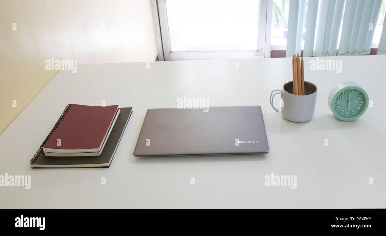 workplace with laptop computer and office supply in modern office Stock ...