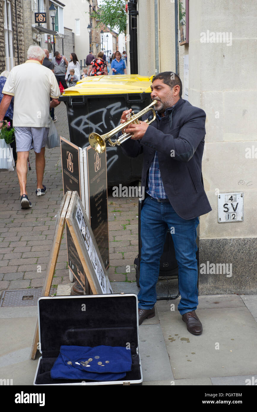 Street performer playing trumpet in hi-res stock photography and images ...
