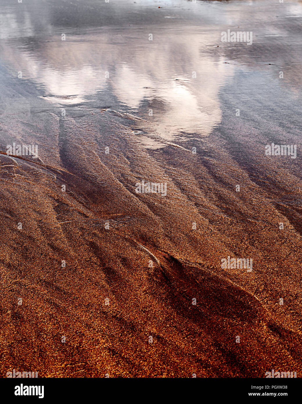 Reflection of cloud in wet sand at Whitesands Bay, Pembrokeshire on the ...