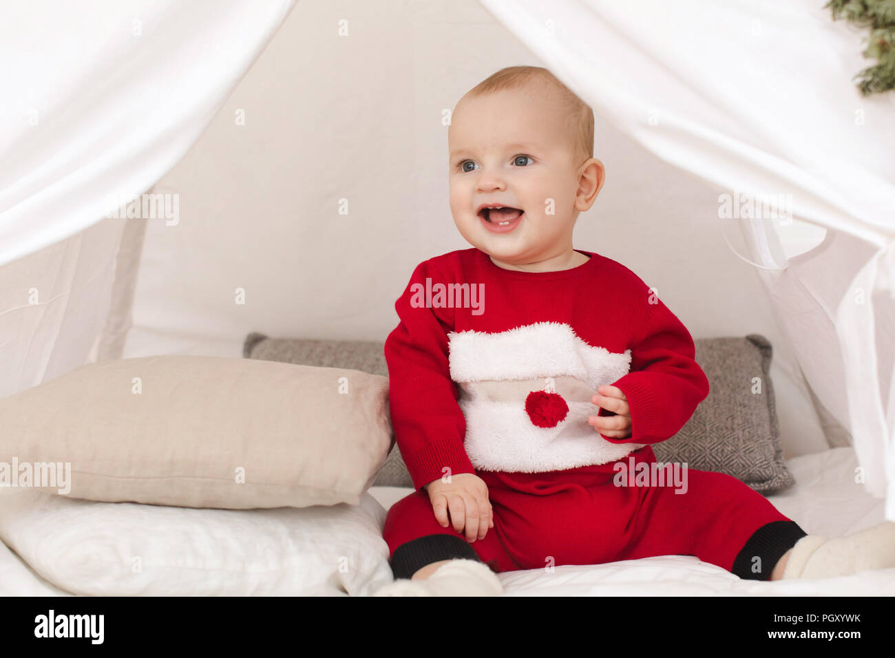 Cute baby in small tent Stock Photo - Alamy