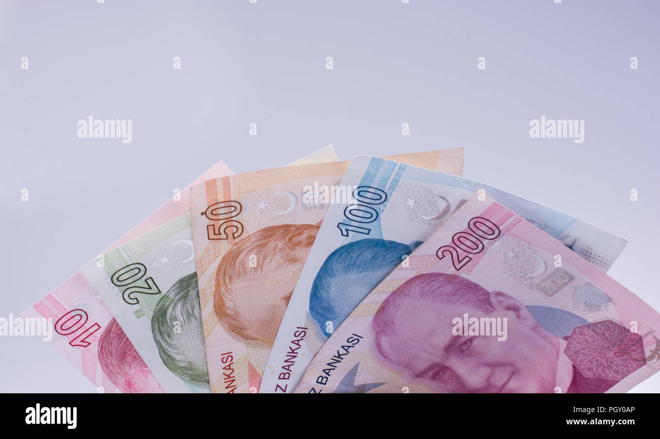 American dollar banknotes and Turksh Lira banknotes side by side on ...