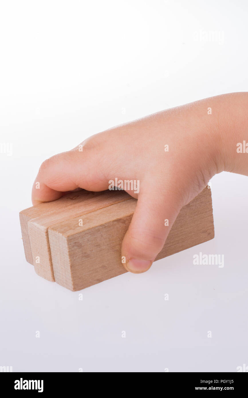 Child playing with building blocks on white background Stock Photo - Alamy