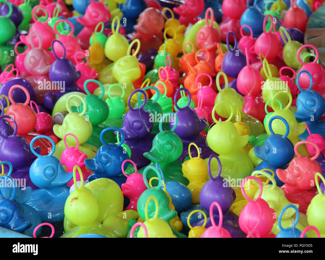 Colorful plastic ducks from a catching game at a Fun Fair Stock Photo ...