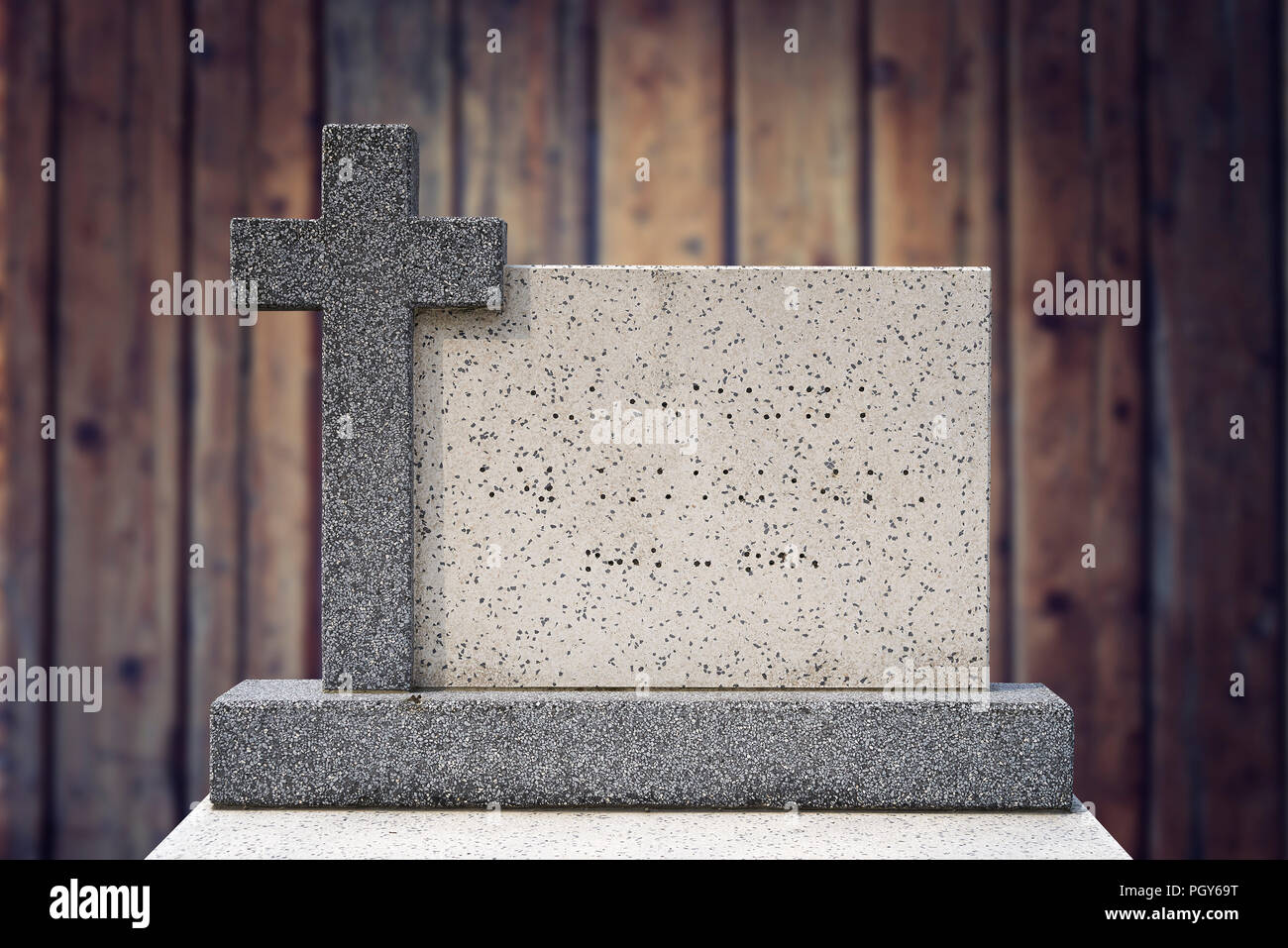 single grave stone cut out with textured wooden background Stock Photo ...