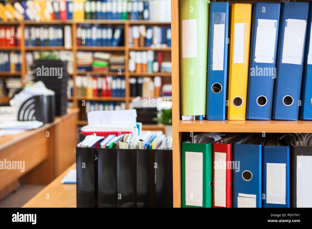 Archive department room with lot of colourful file binders Stock Photo ...