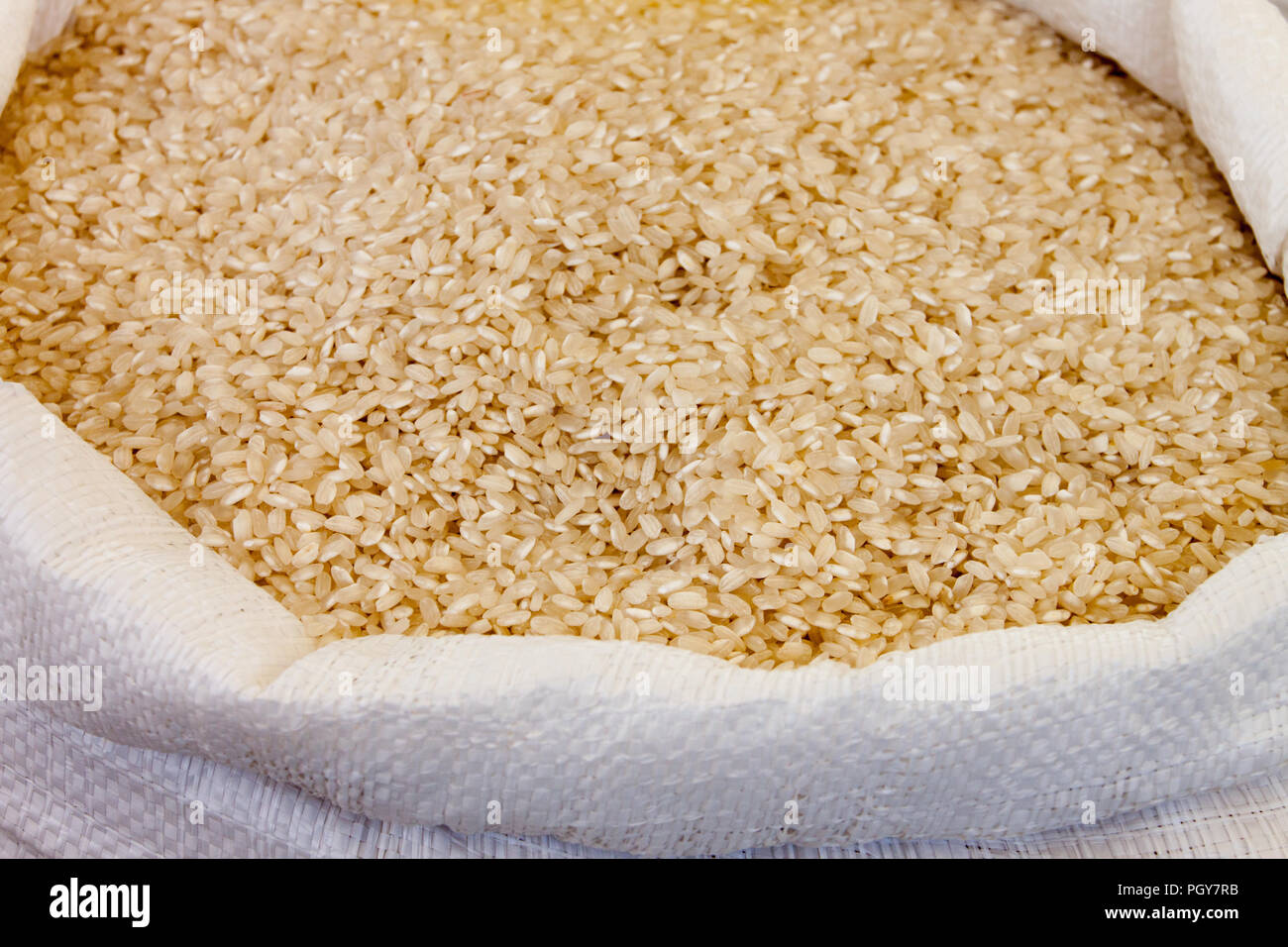 Raw rice sack isolated on hi-res stock photography and images - Alamy
