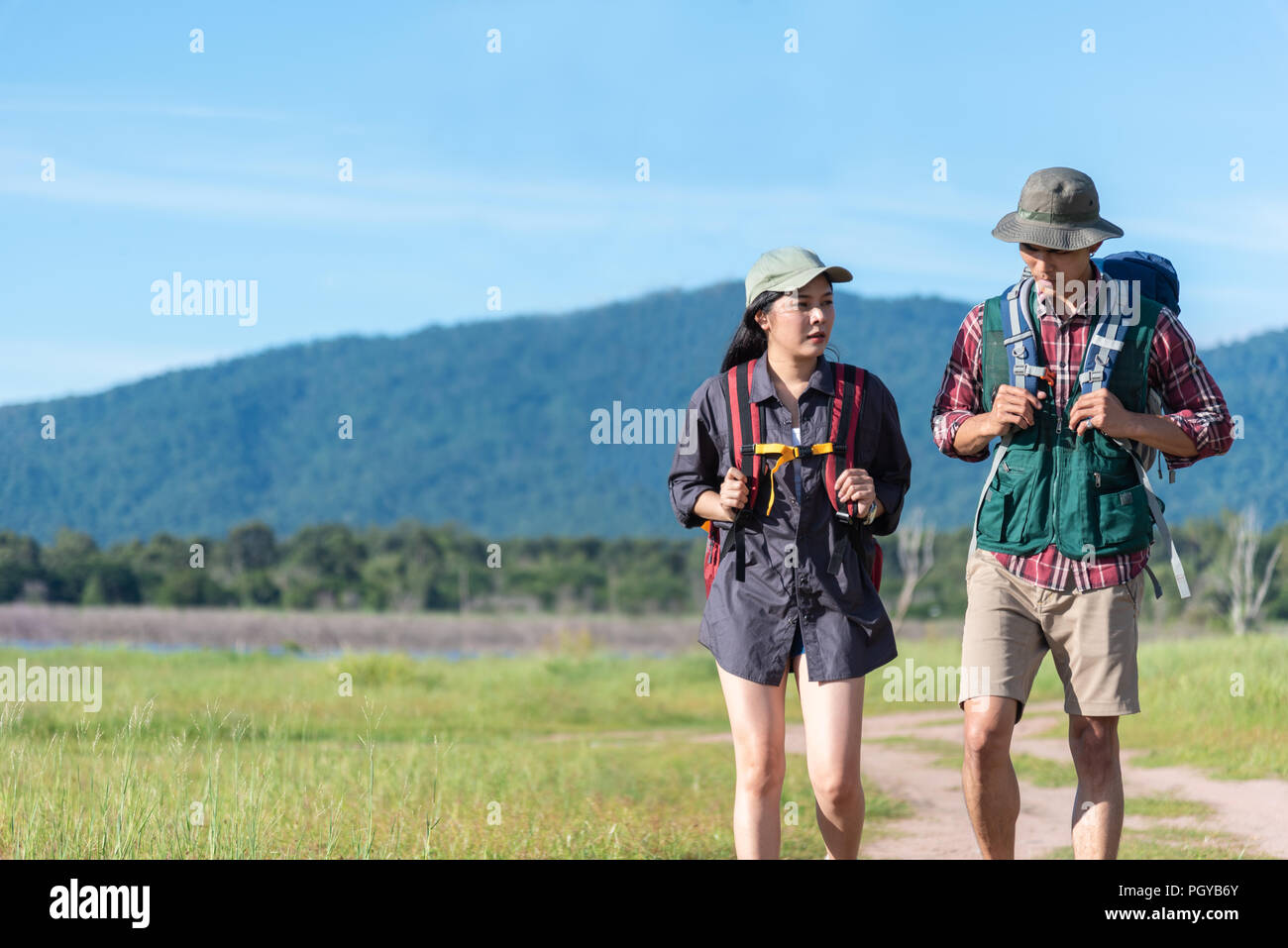 Two people walking together two people walking in the countryside hi ...