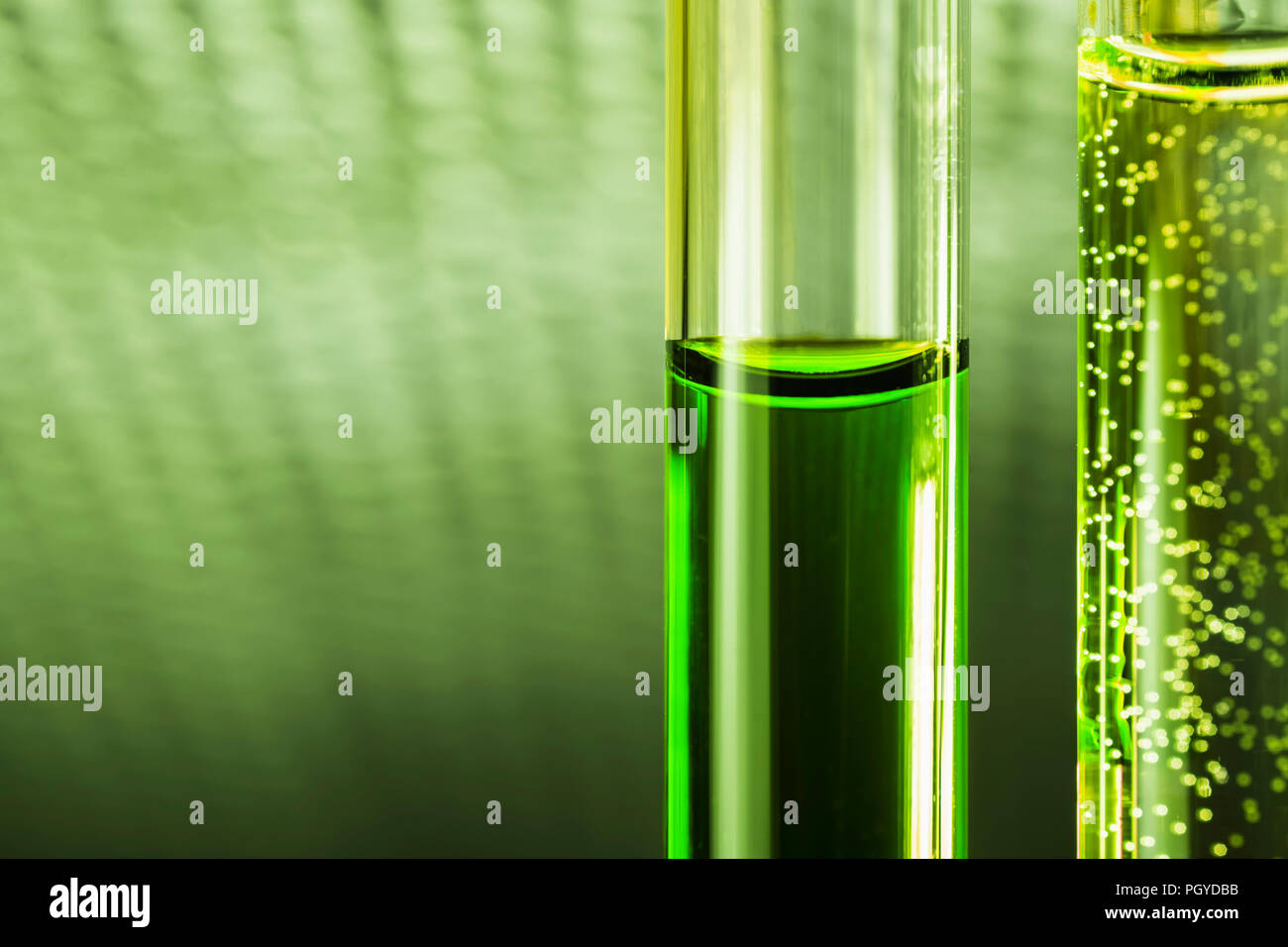 Green liquid chemical weapon in glass tubes Stock Photo - Alamy