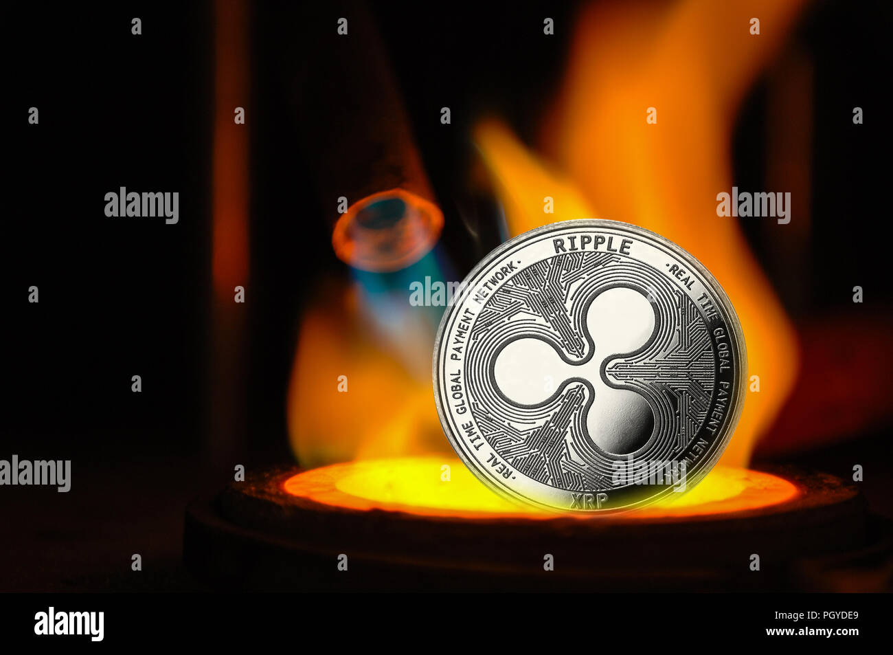 Melted Ripple Coin Money Stock Photo - Alamy