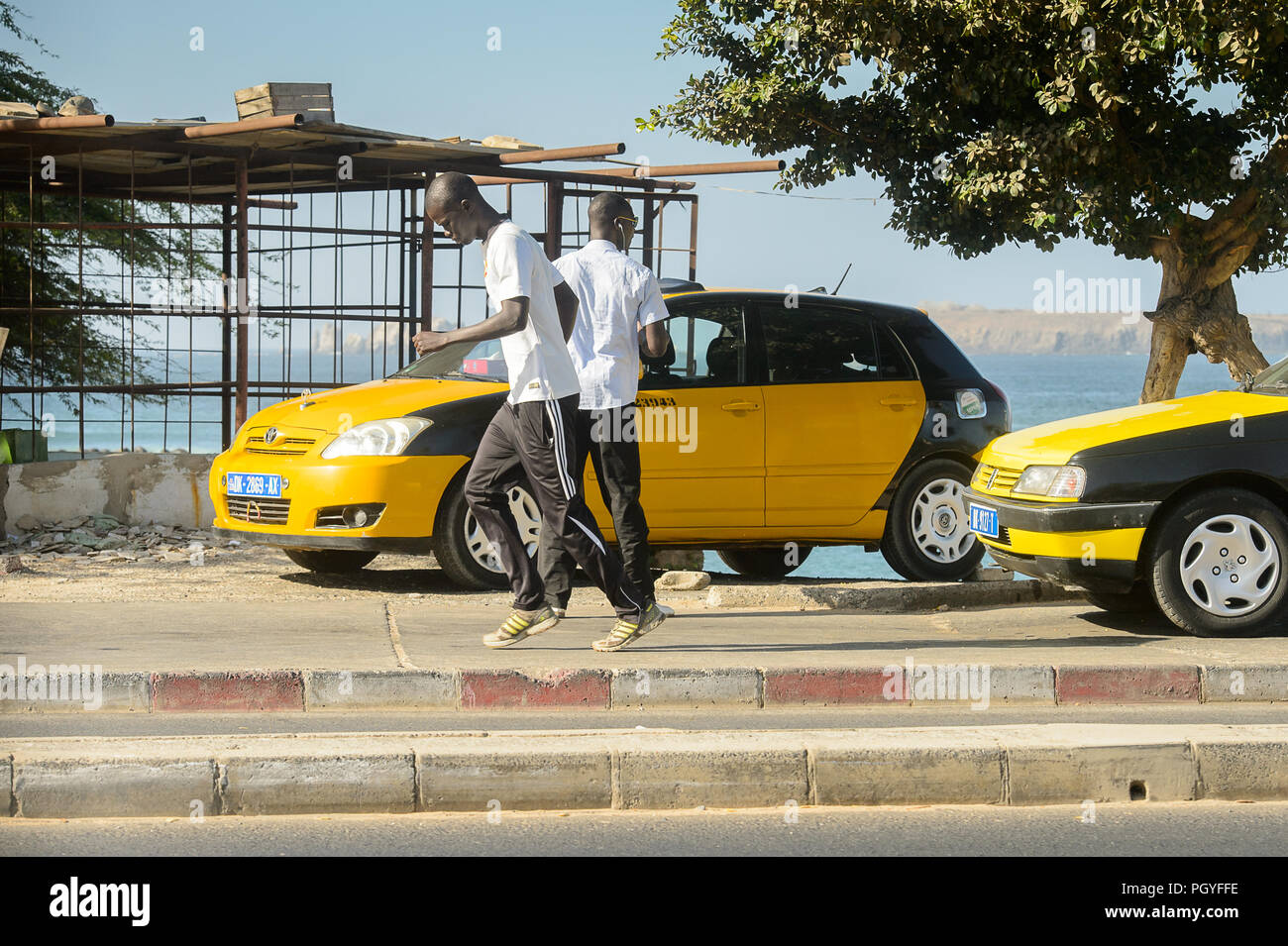 DAKAR, SENEGAL - APR 23, 2017: Unidentified Senegalese two men stand ...