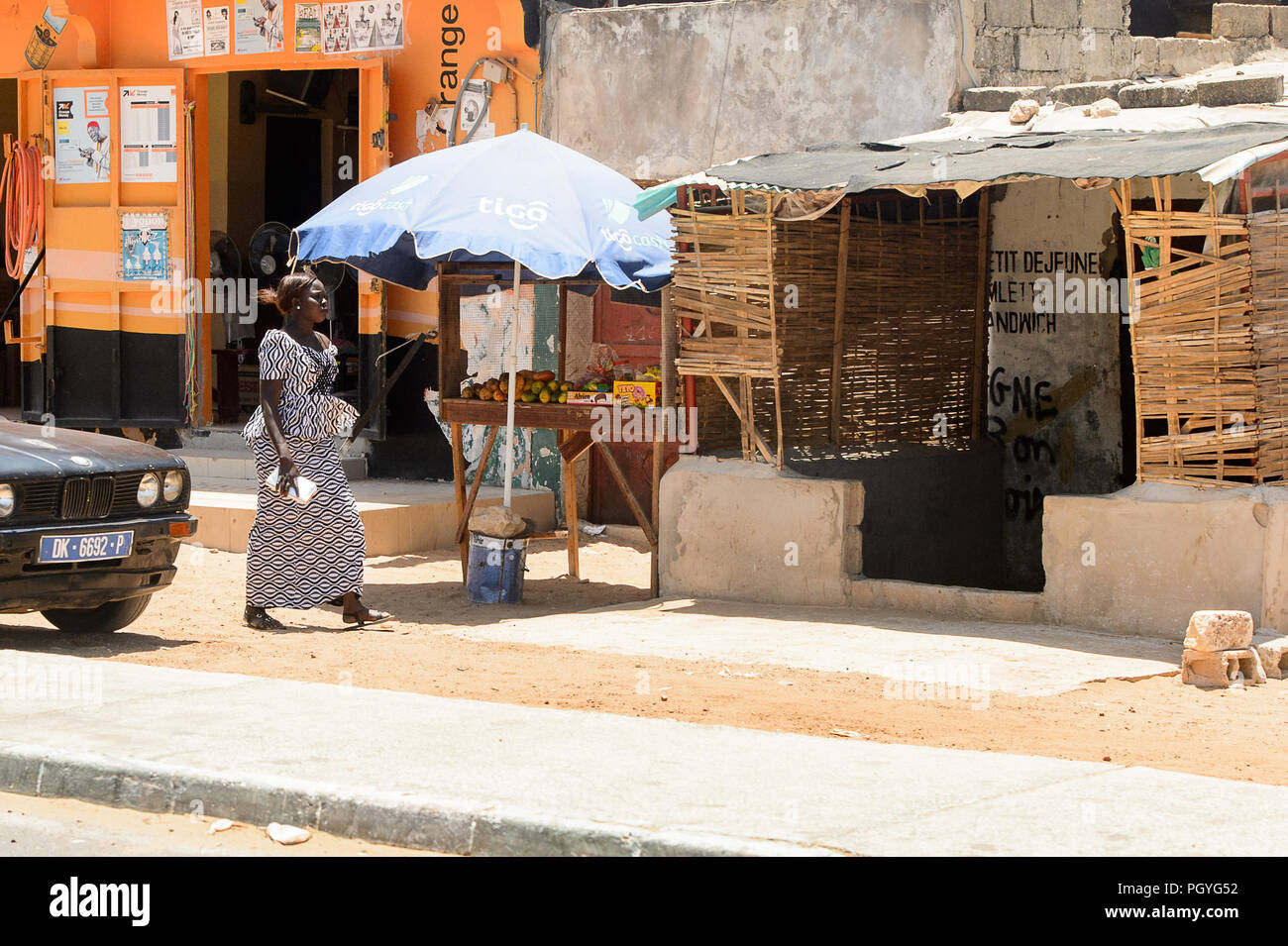 ROAD TO LAMPOUL, SENEGAL - APR 23, 2017: Unidentified Senegalese woman ...