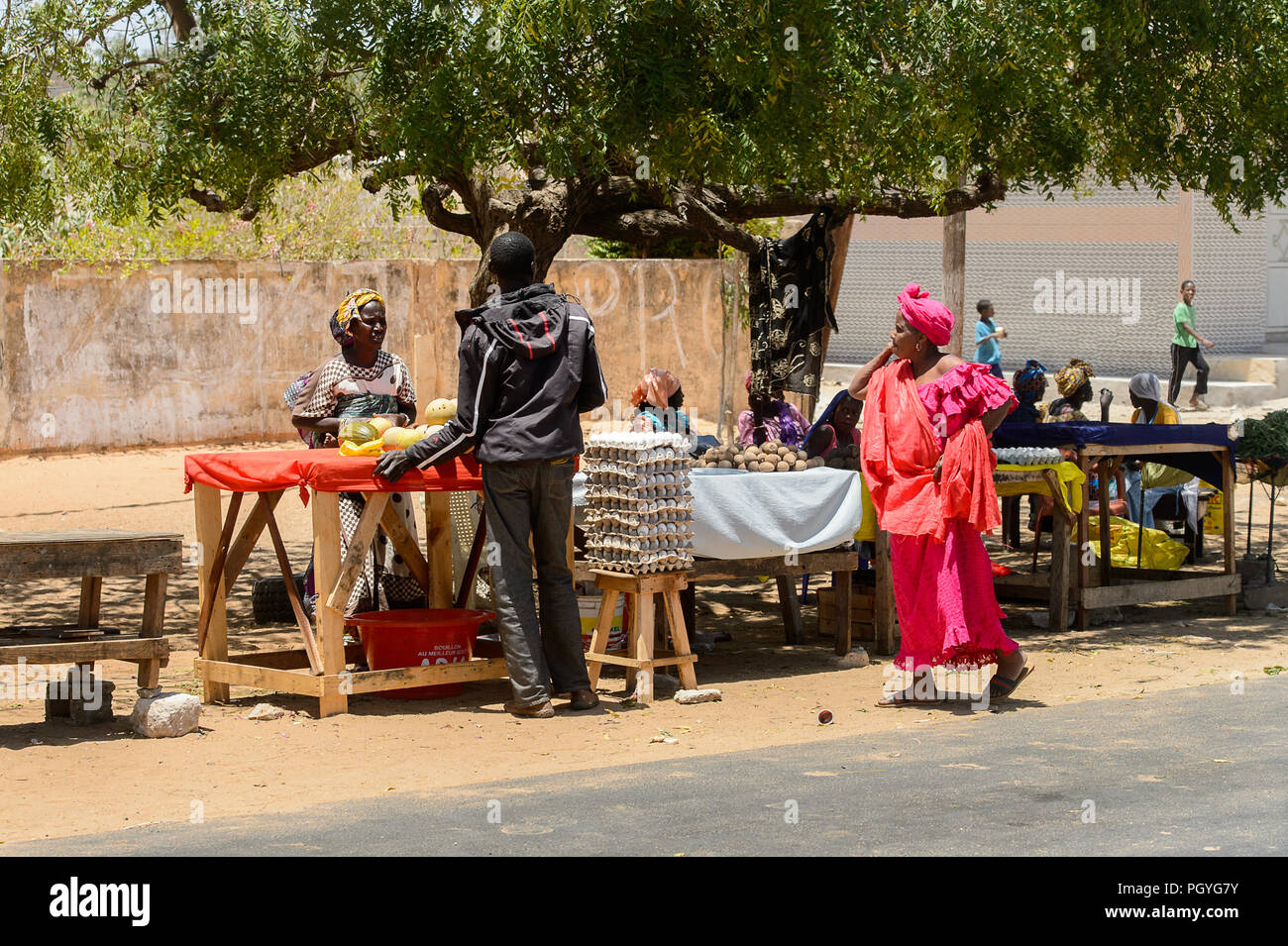 ROAD TO LAMPOUL, SENEGAL - APR 23, 2017: Unidentified Senegalese woman ...