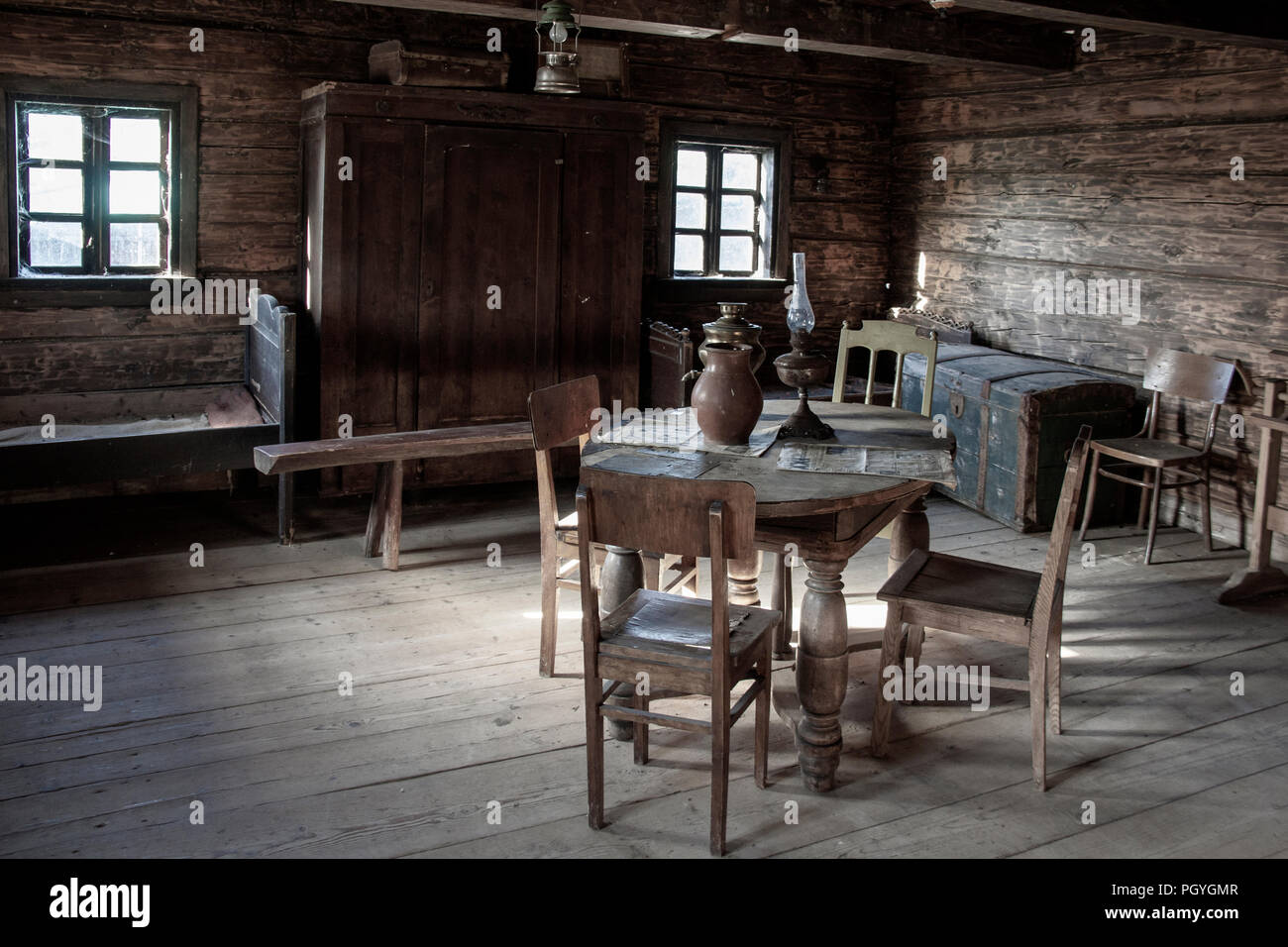 Vintage Room With Bed, Table and Chairs in Old Rural House Stock Photo ...