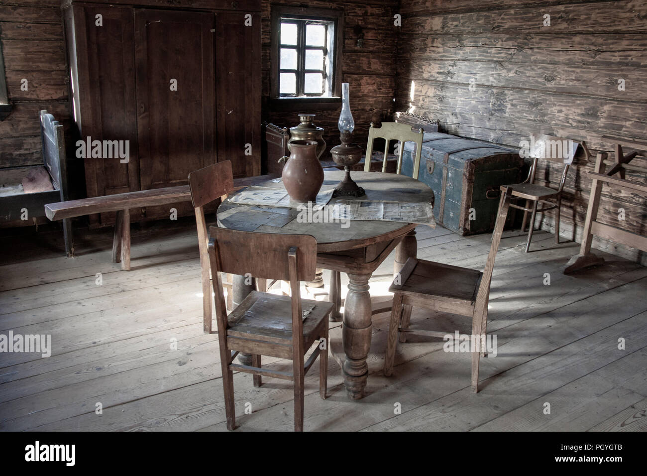 Vintage Room With Bed, Table and Chairs in Old Rural House Stock Photo ...