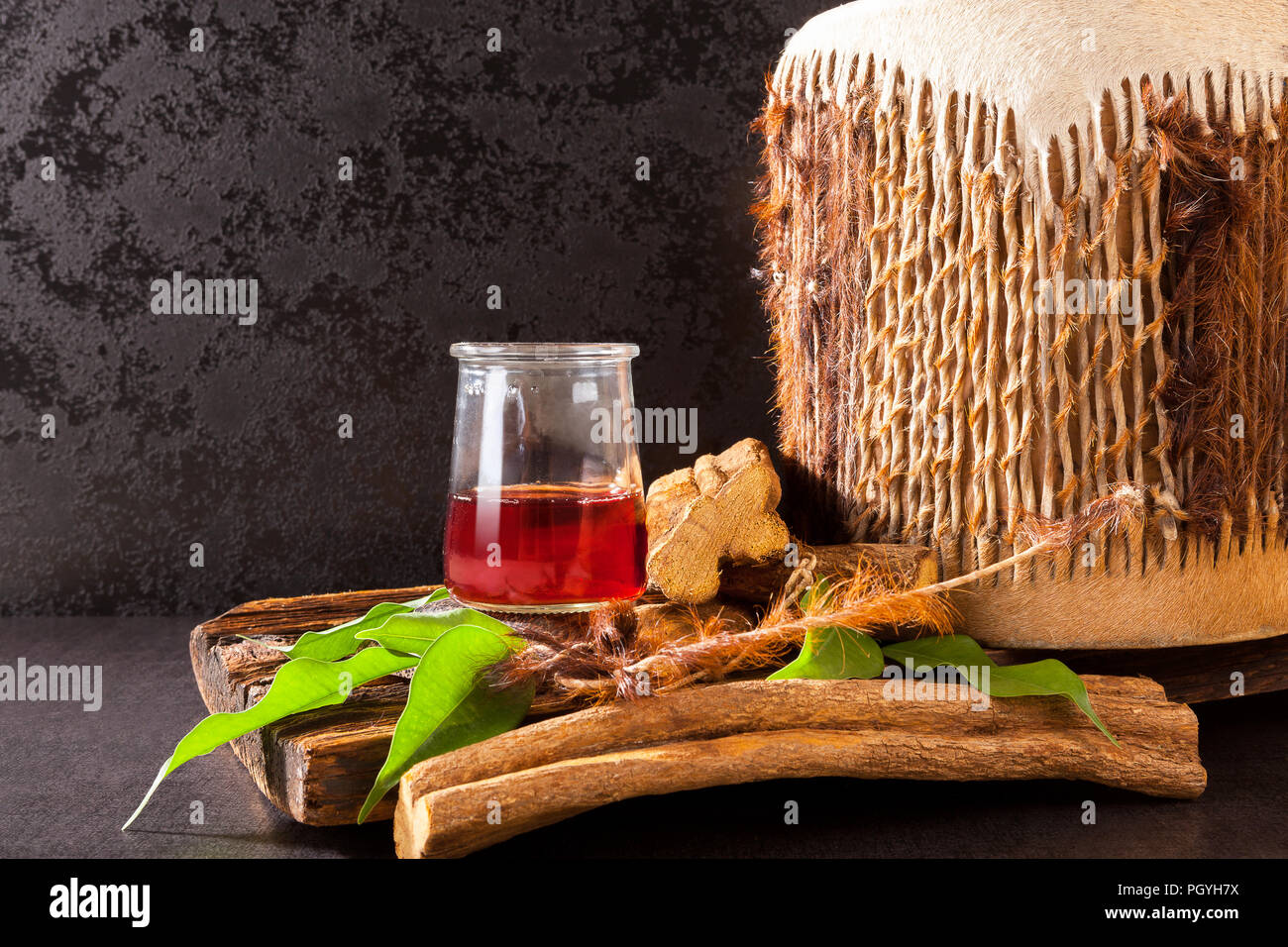 Ayahuasca brew with shamanic drum and medicinal herbs Stock Photo - Alamy