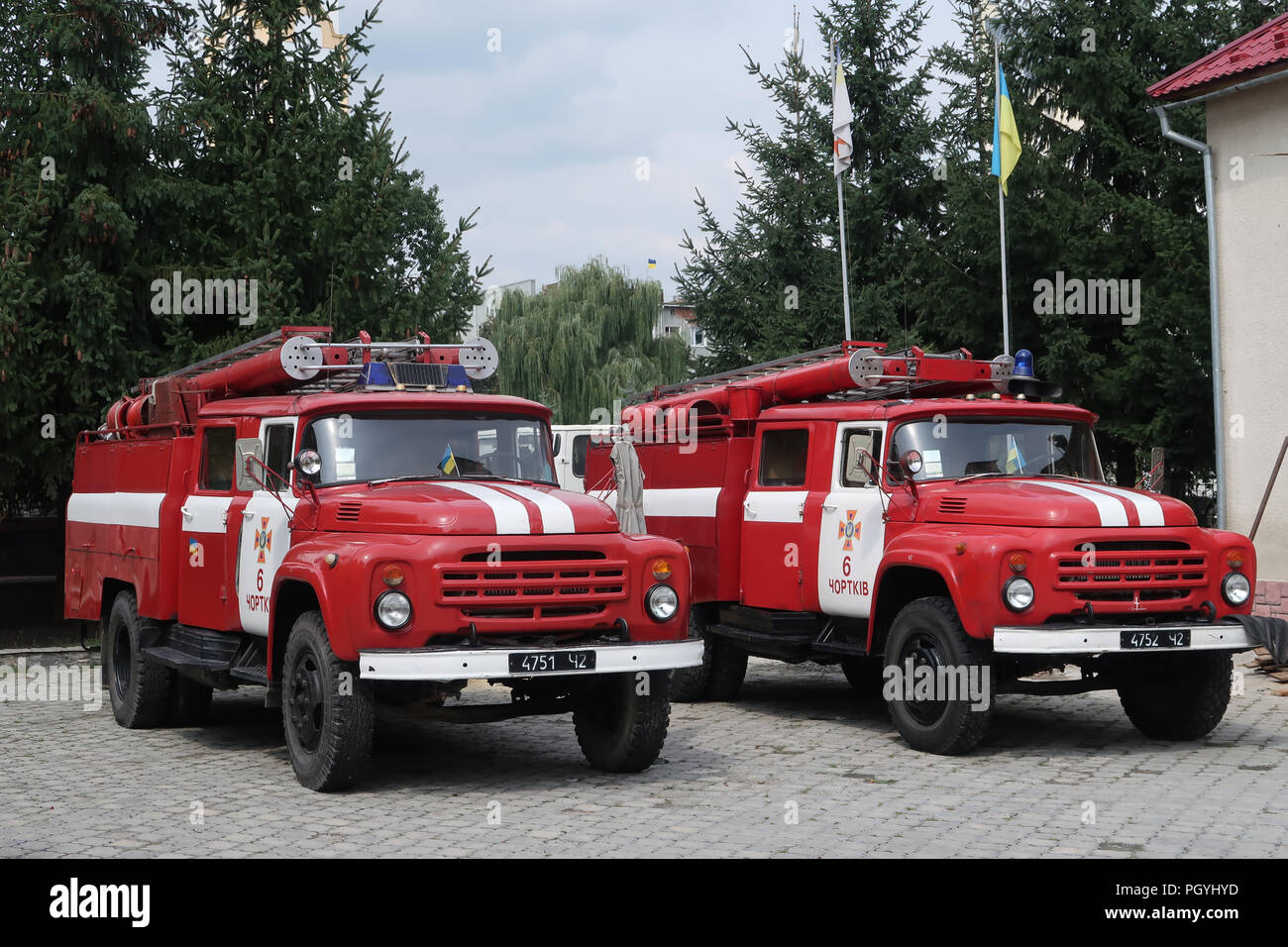 Fire engine trucks parked in fire fighters station in the city of ...