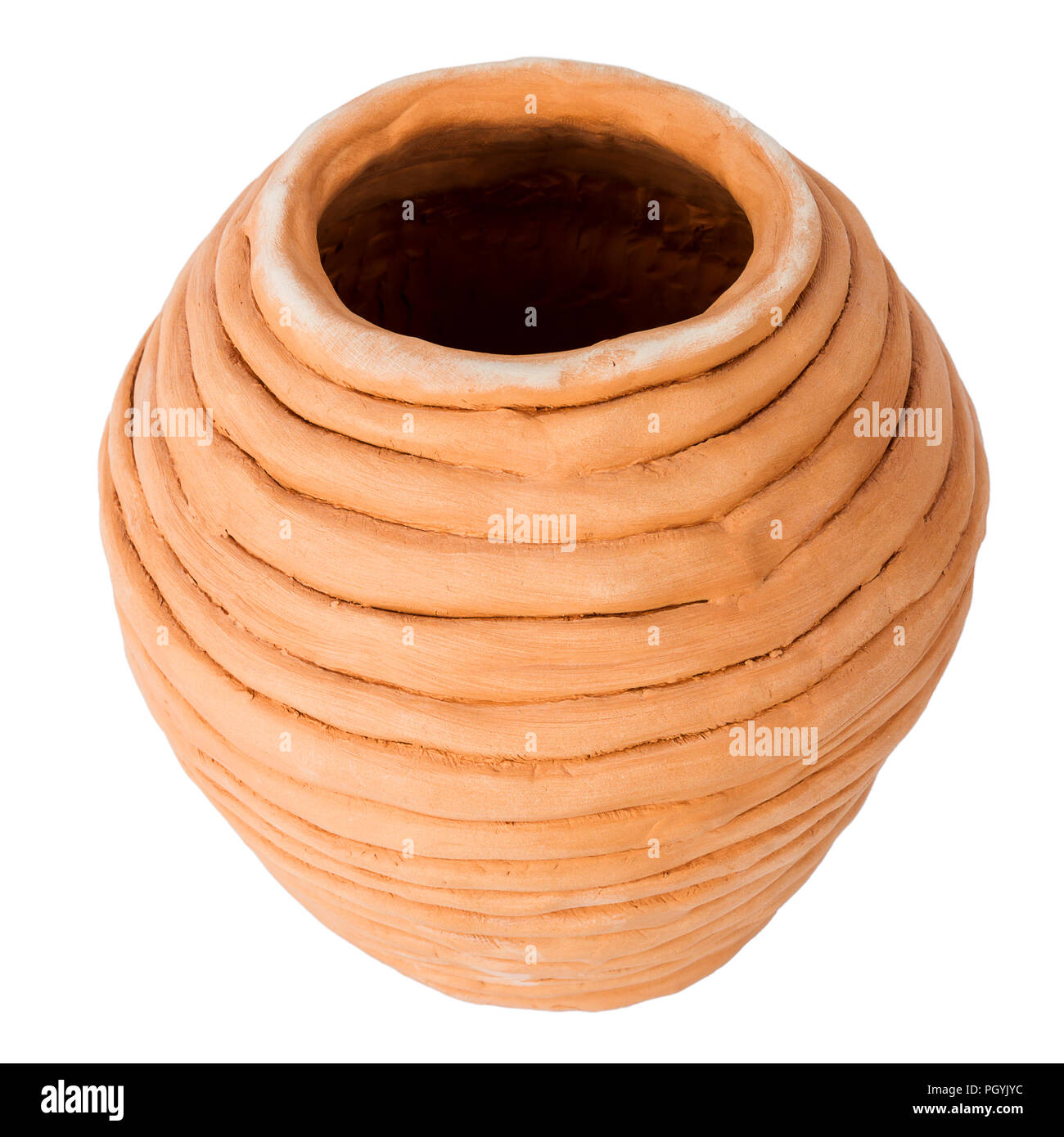Unglazed handmade coiled pottery pot made of red clay isolated on white ...