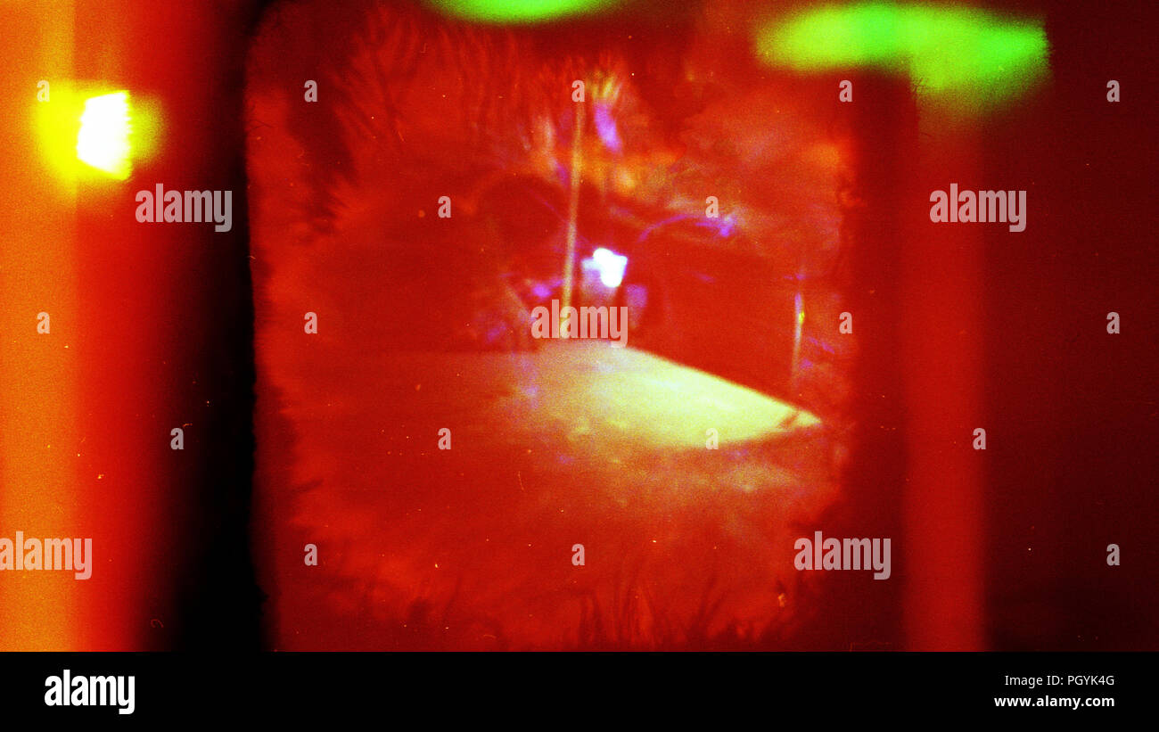 Abstract film texture background with heavy grain, dust and light leak ...