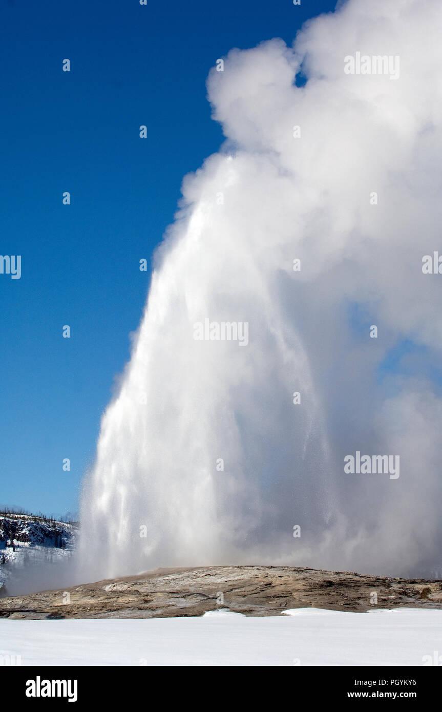 Geyser yellowstone snow hi-res stock photography and images - Alamy