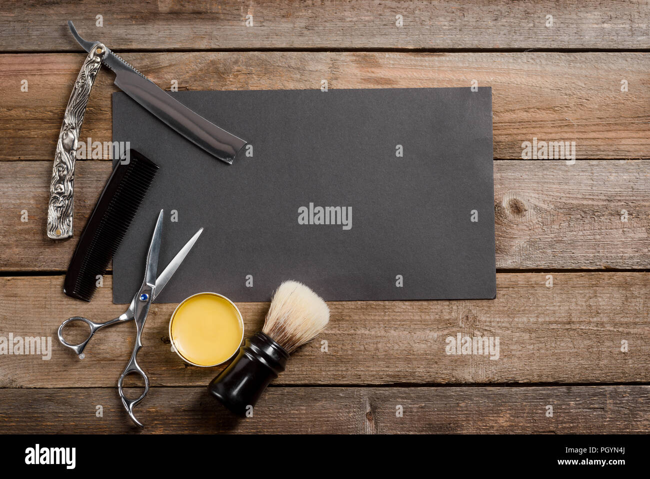 Straight razor, scissors and comb Stock Photo - Alamy