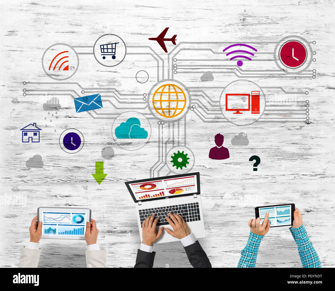 Group of three people with devices in hands working together as symbol ...