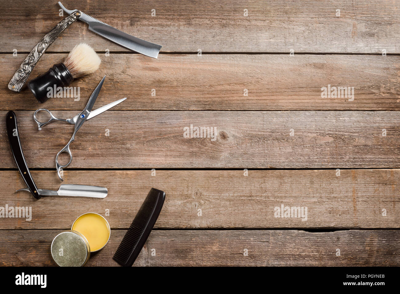 Comb, wax and straight razors Stock Photo - Alamy