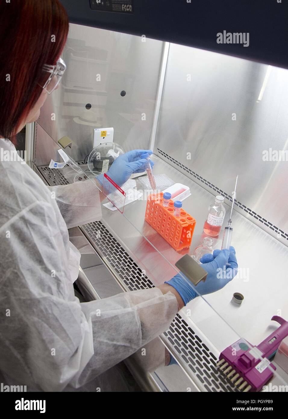 Centers for Disease Control (CDC) epidemiologist conducting HIV test ...