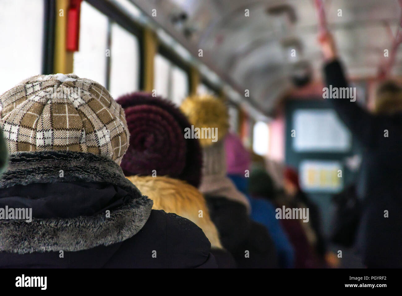 warmly dressed people in winter public transport Stock Photo - Alamy