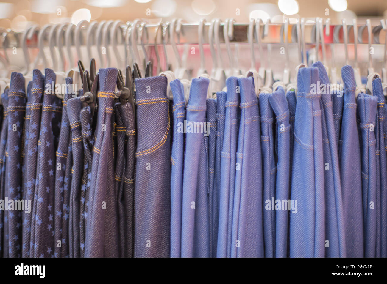Hangers at a clothing store Stock Photo - Alamy