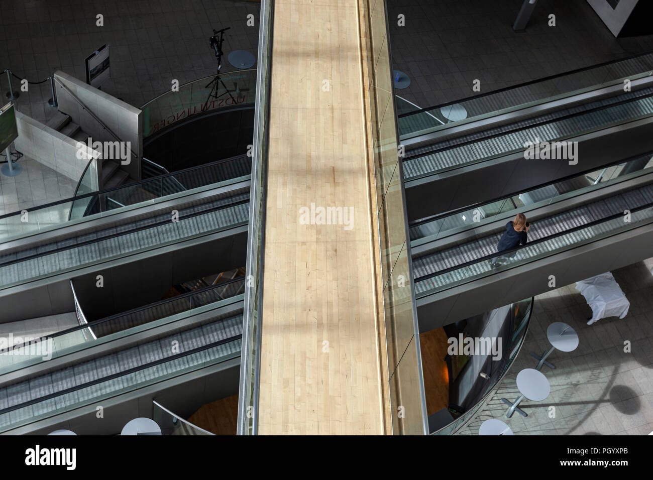Man in the escalator in the Royal Danish Library, The Black Diamond ...