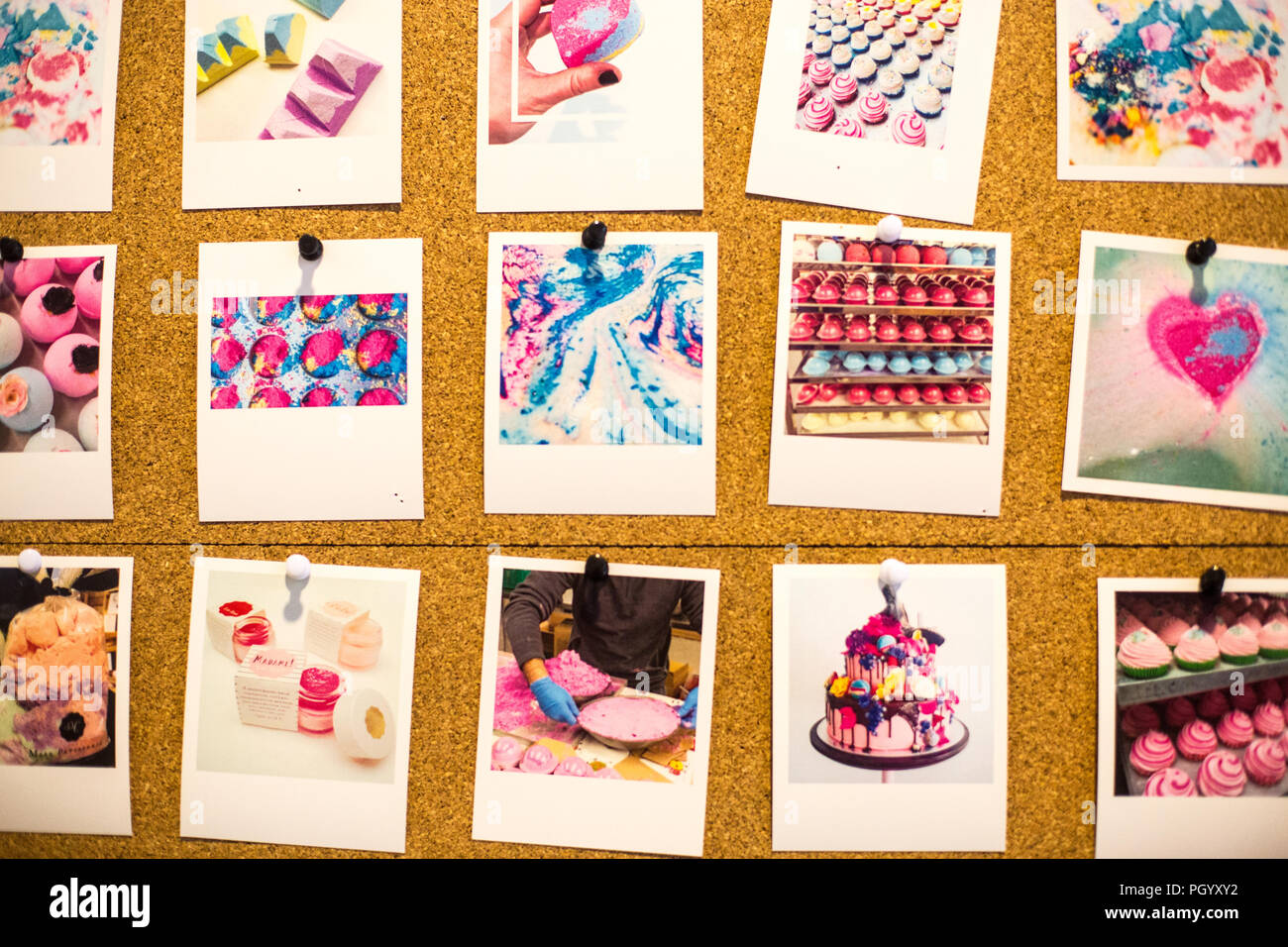 Post Cards on a cork board Stock Photo - Alamy