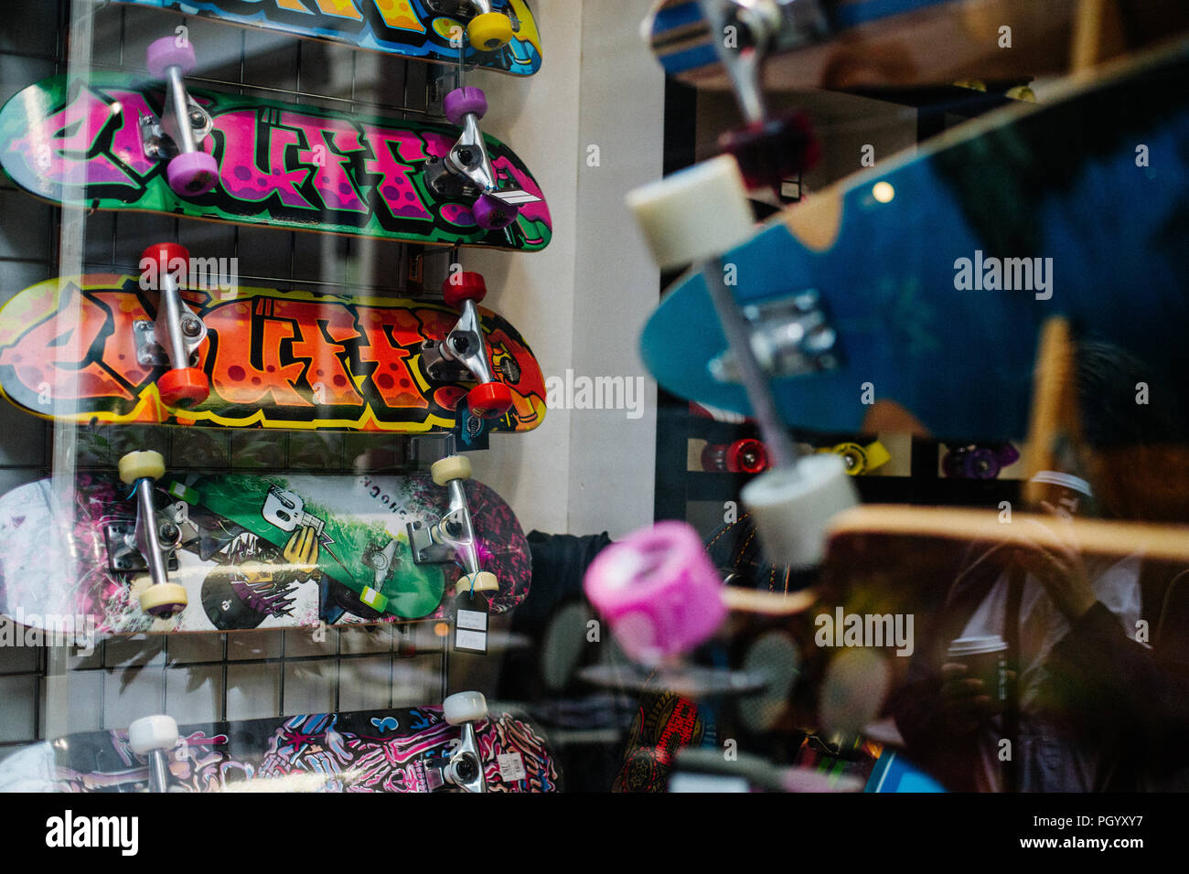 Skateboards in a shop window Stock Photo - Alamy